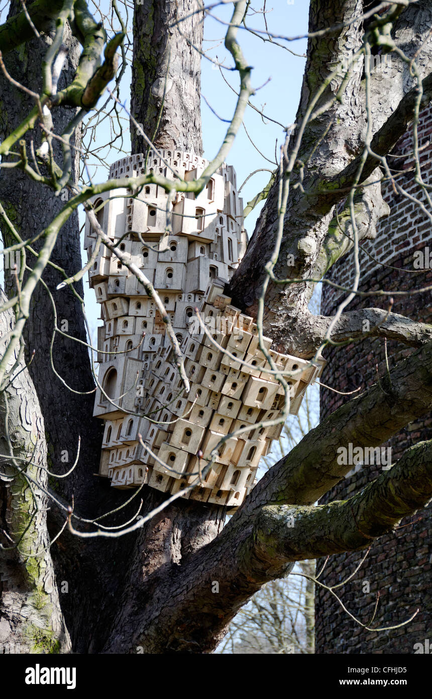 Bird houses mounted in a tree to encourage nesting, by the Cow tower ...