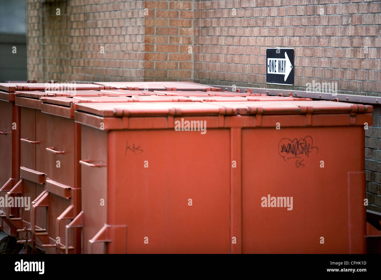 Dumpsters behind building Stock Photo - Alamy
