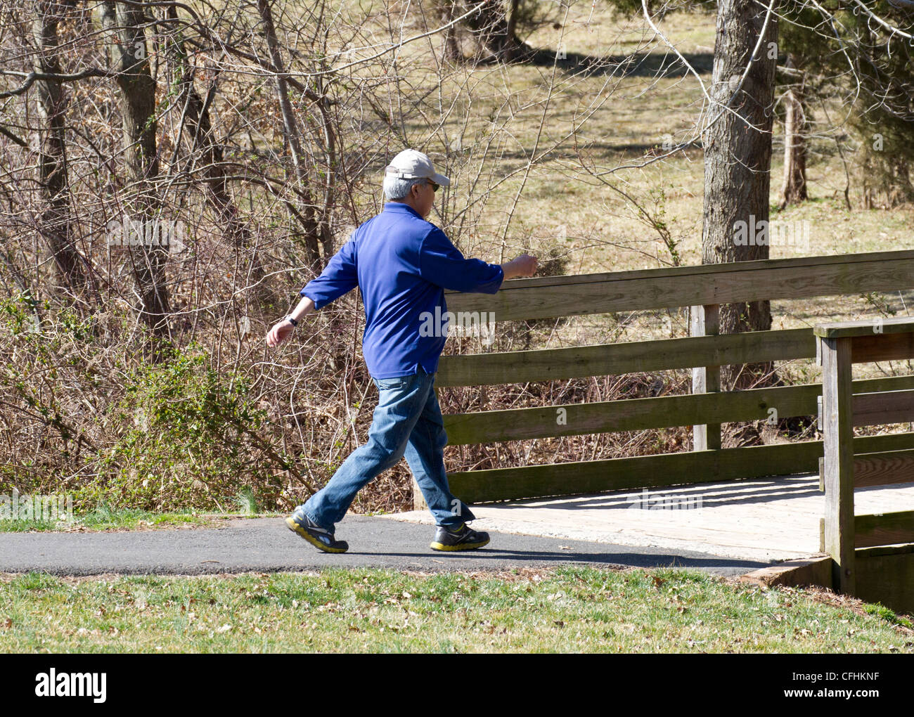 Walking swinging arms hi-res stock photography and images - Alamy