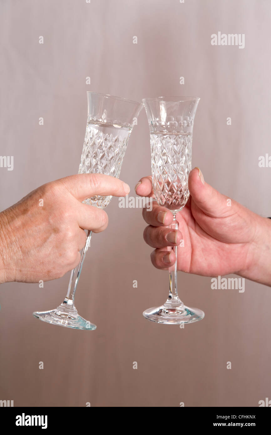 People making a Toast with Champagne glasses Stock Photo - Alamy