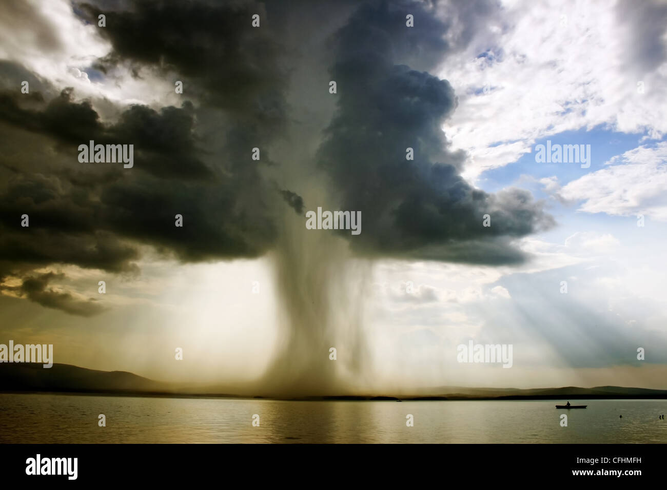 the beginning of the tornado over the lake Stock Photo - Alamy