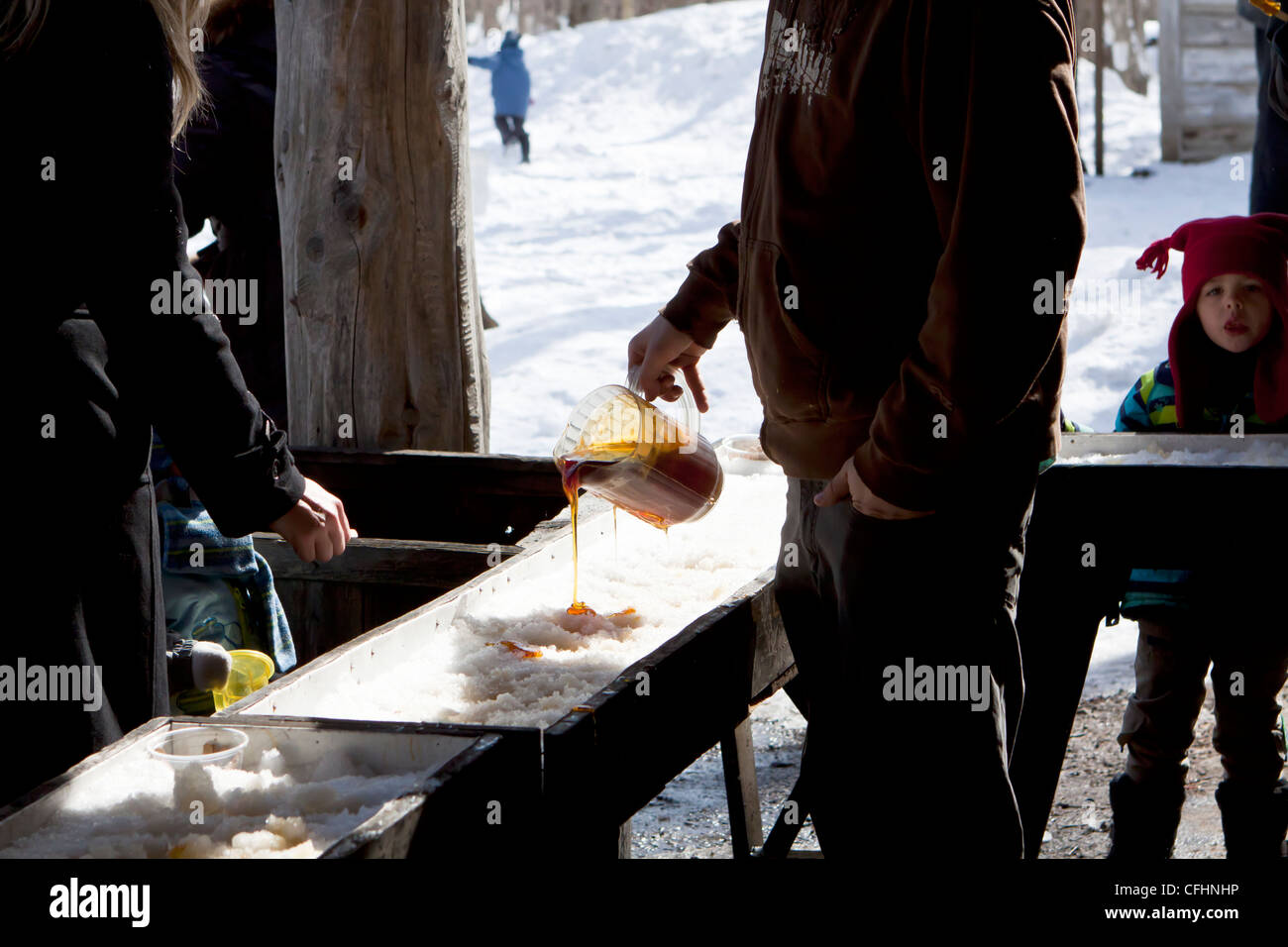 Maple taffy on snow hi-res stock photography and images - Alamy