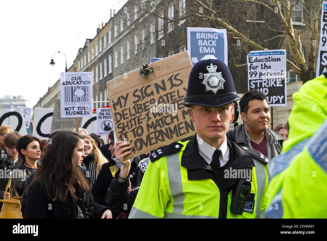 London, UK. 14/03/12.Students protest through London with banners and ...