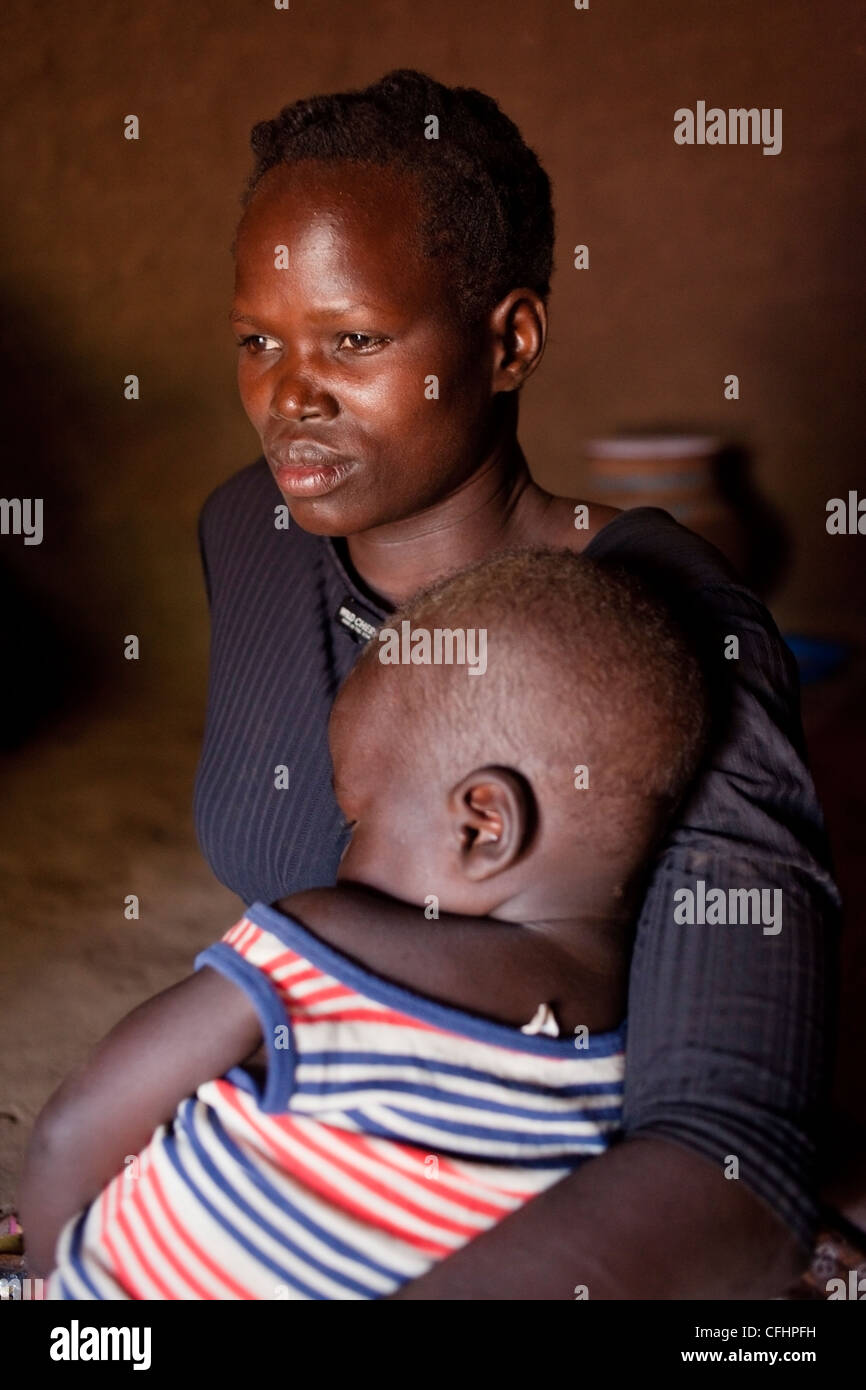 Former LRA child soldier with her child near Gulu, Uganda, Africa Stock ...