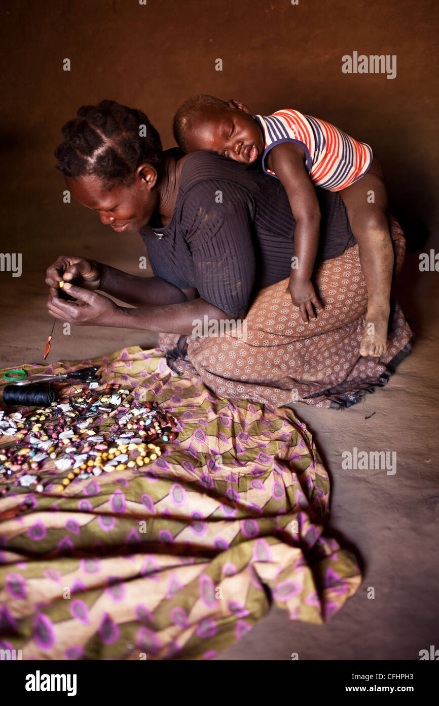 Former LRA child soldier is doing bead work to supplement her income ...