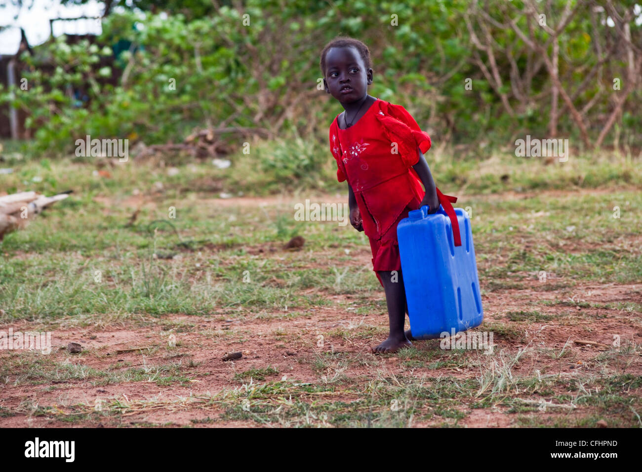 Child fetching water hi-res stock photography and images - Alamy