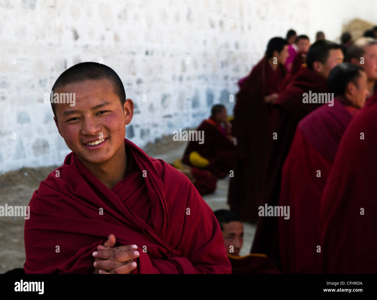 A smiling Tibetan monk in Labrang monastery, Xiahe Stock Photo - Alamy