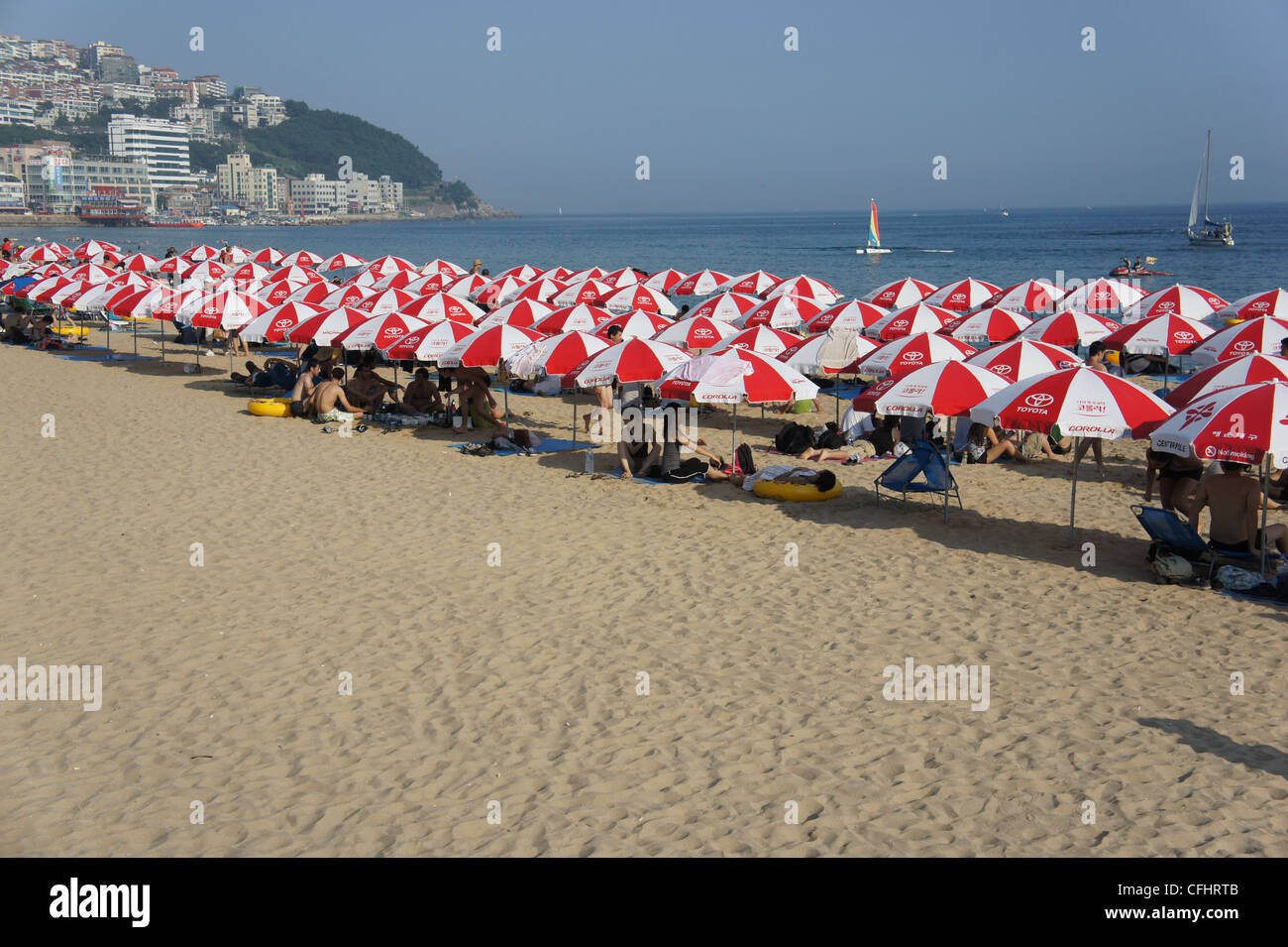 Colorful Umbrellas on busan beach haeundae in South Korea Stock Photo ...