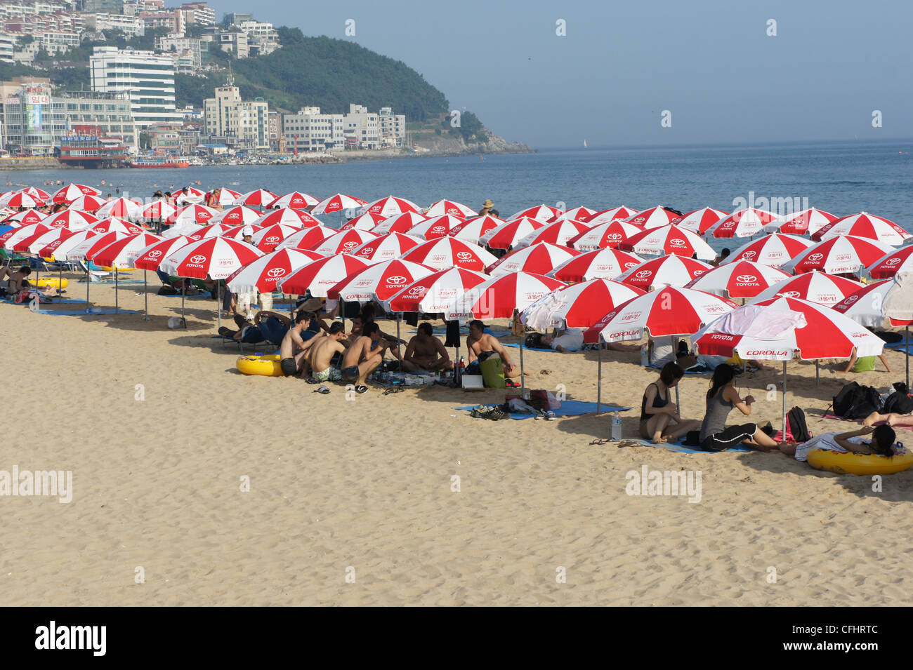 Colorful Umbrellas on busan beach haeundae in South Korea Stock Photo ...