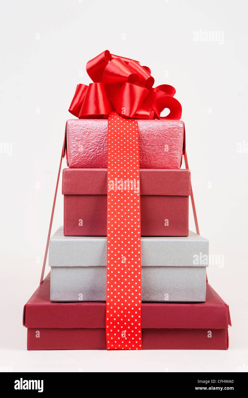 The red and silver gift boxes with big red ribbon Stock Photo - Alamy
