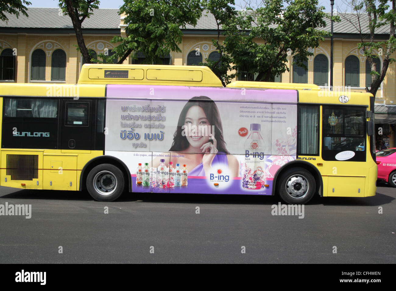 Advertisement on local bus in Bangkok Stock Photo - Alamy