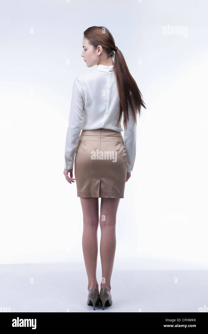 The standing woman from the back Stock Photo - Alamy