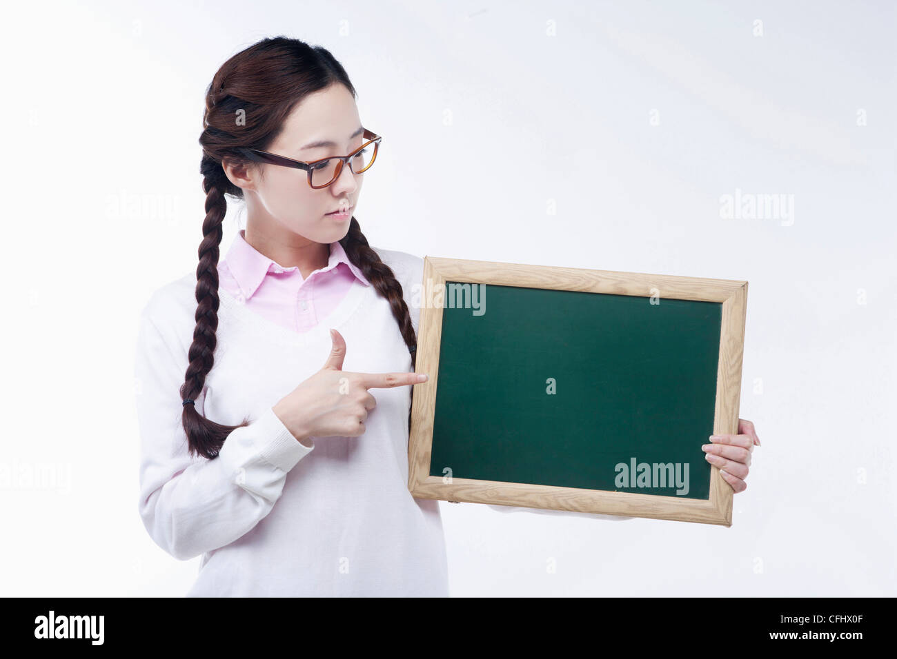 The woman pointing the black board Stock Photo - Alamy