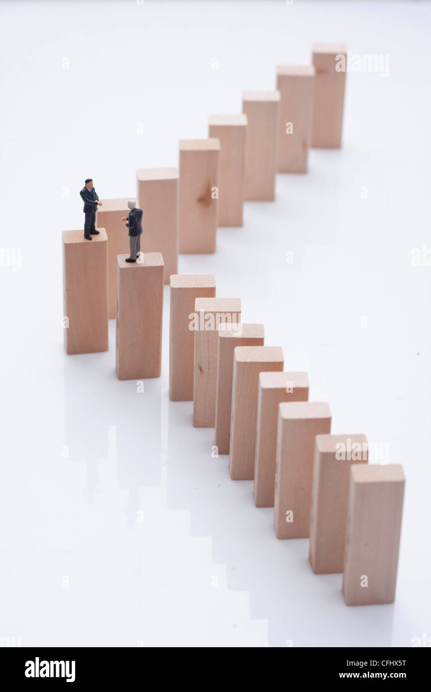 The two model men on the wood blocks Stock Photo - Alamy
