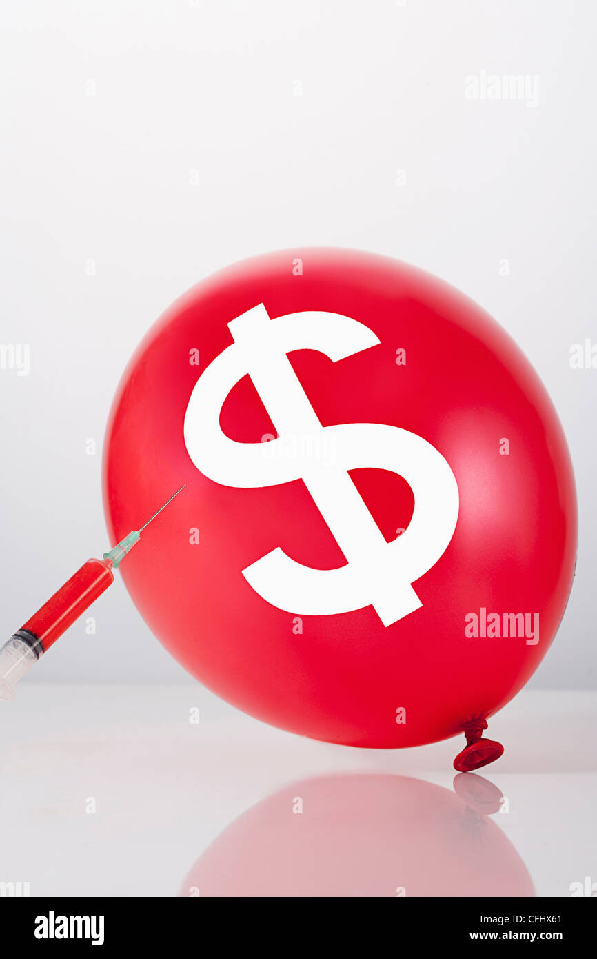 The red Dollar balloon and red liquid filled syringe Stock Photo - Alamy
