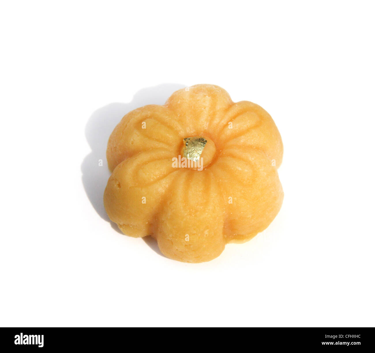 Egg yolks dumpling topped with an edible gold leaf Cut Out Stock Images ...