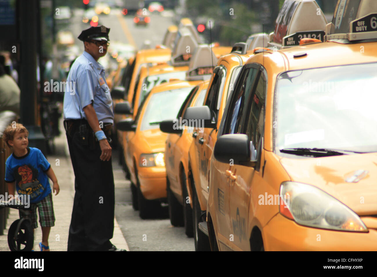NYC Taxi and Policeman Stock Photo - Alamy