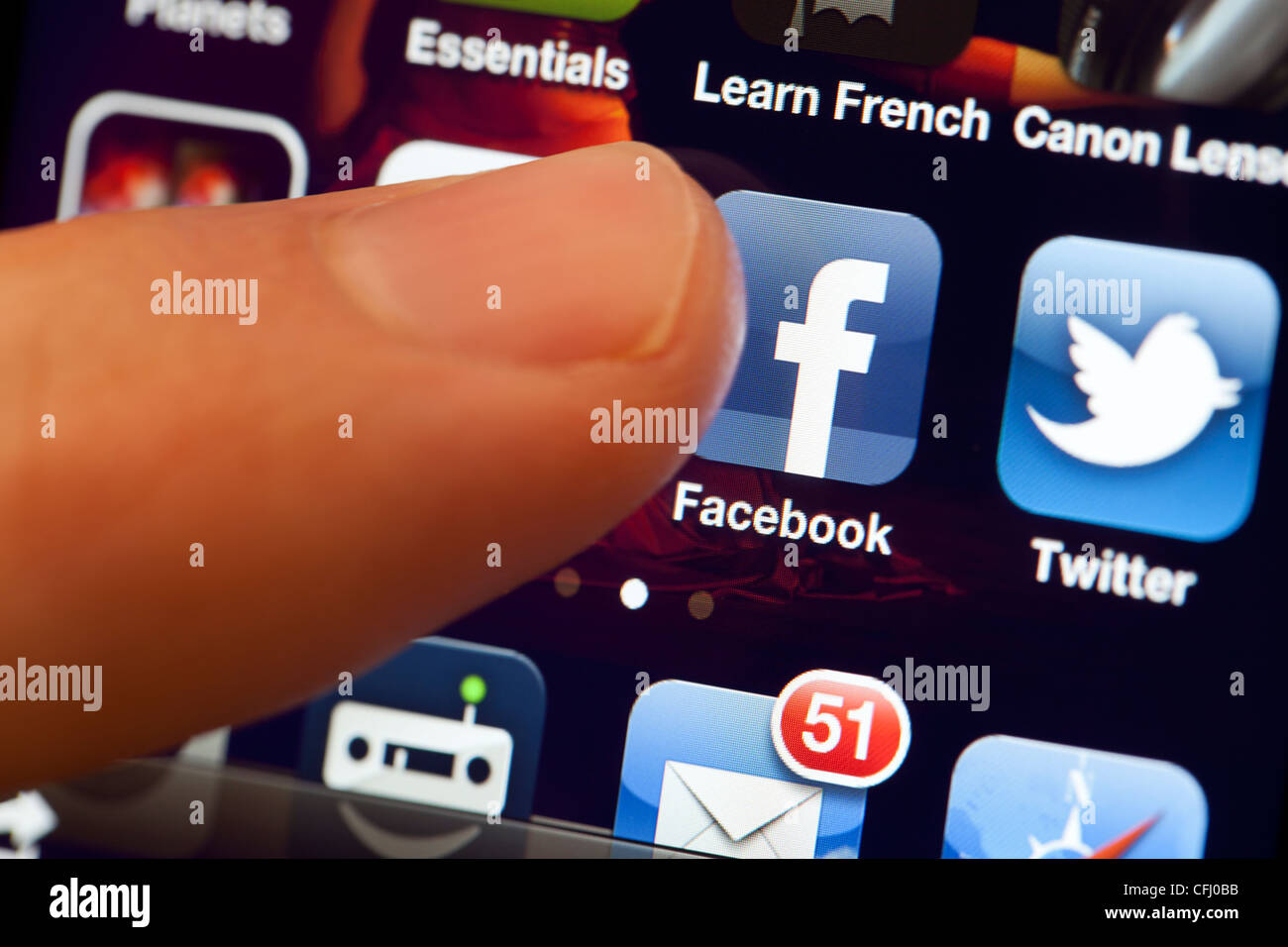 Touch to launch Facebook app Stock Photo - Alamy