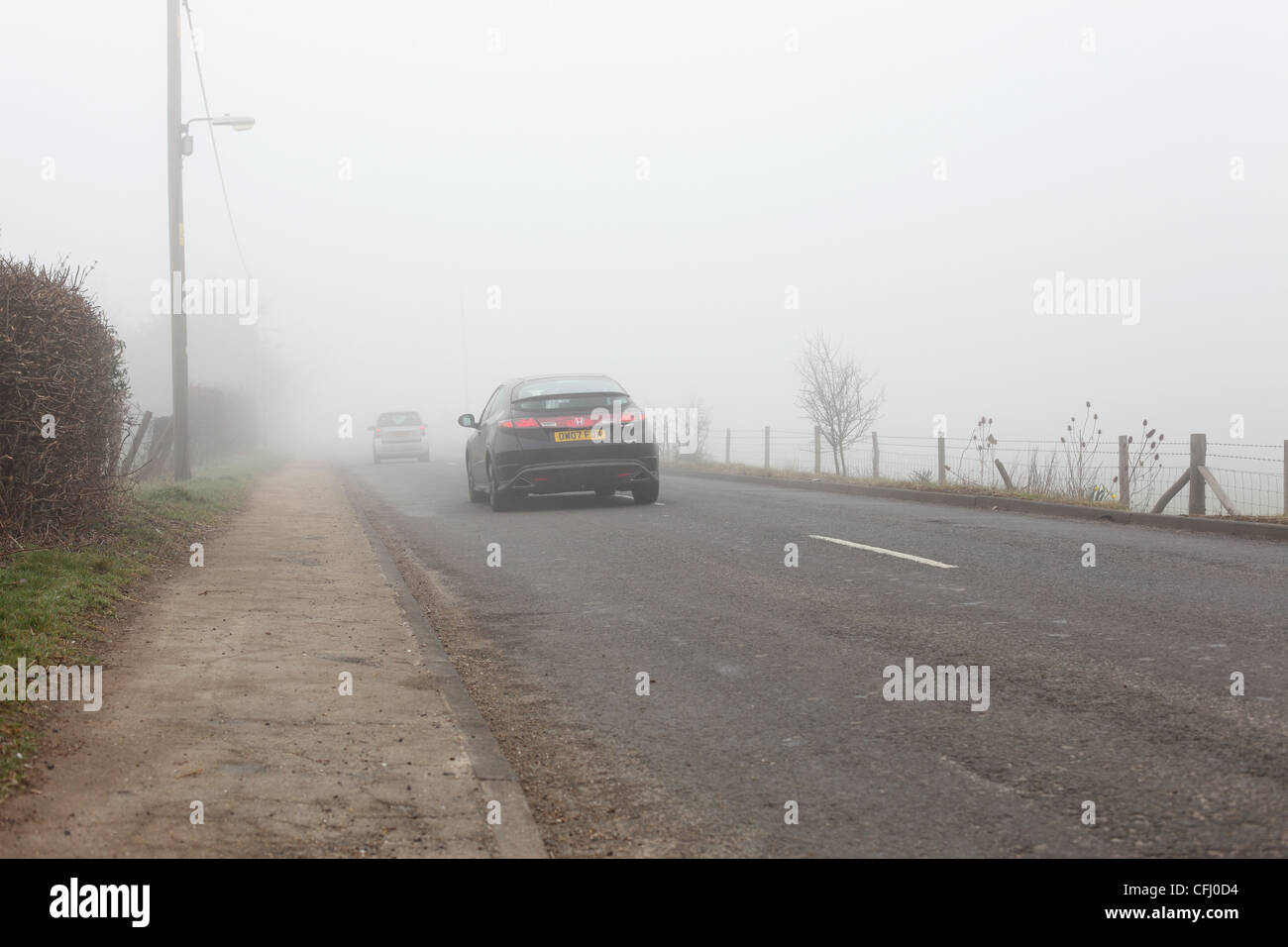 Car headlights in fog hi-res stock photography and images - Alamy