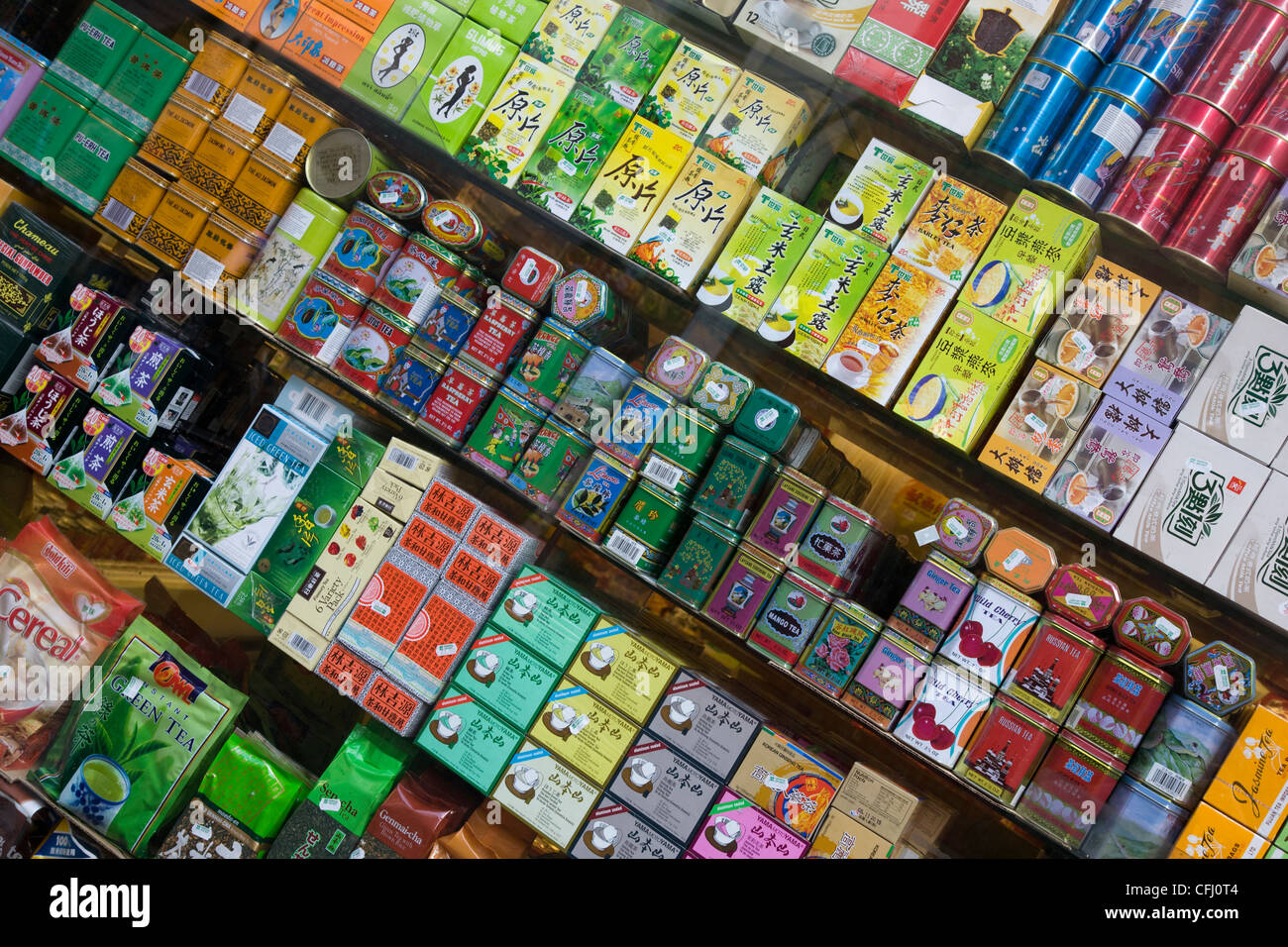 Shop window in Chinatown, London, with a range of Chinese teas, herbs ...