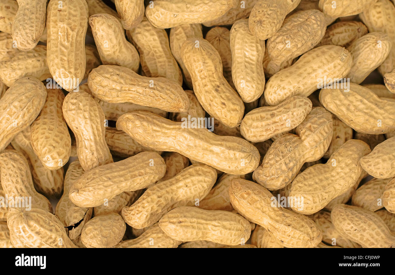 Stack of peanuts-useful background image Stock Photo - Alamy