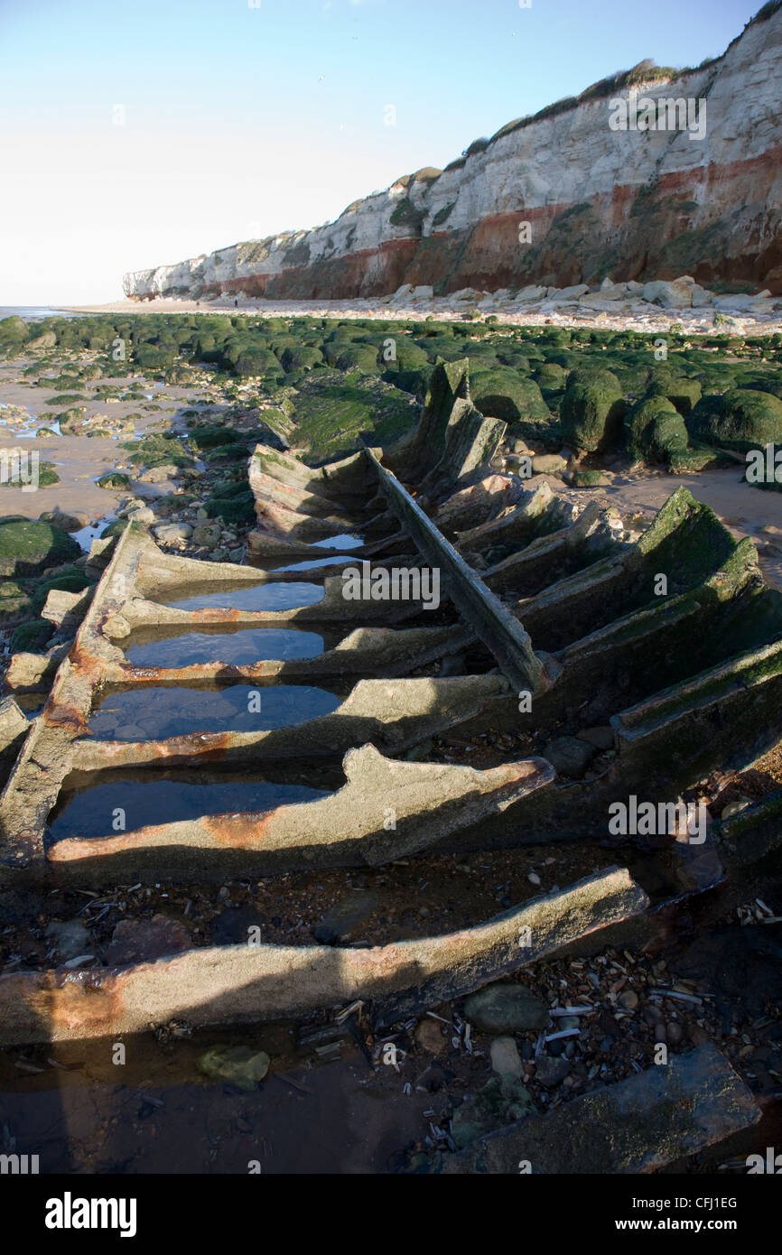 Cliffs made of red and white layered sedimentary rock with horizontal ...
