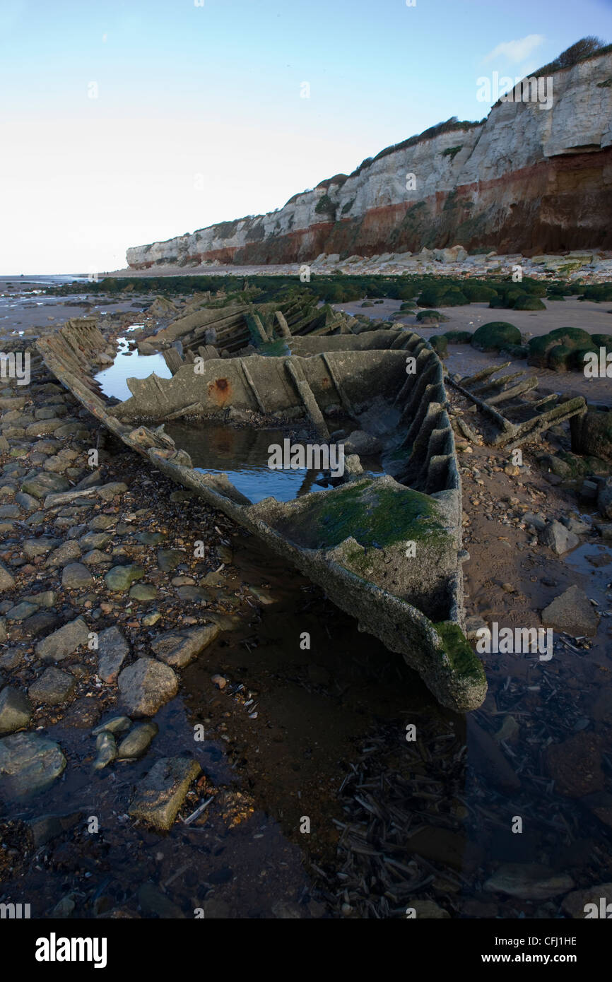 Cliffs made of red and white layered sedimentary rock with horizontal ...