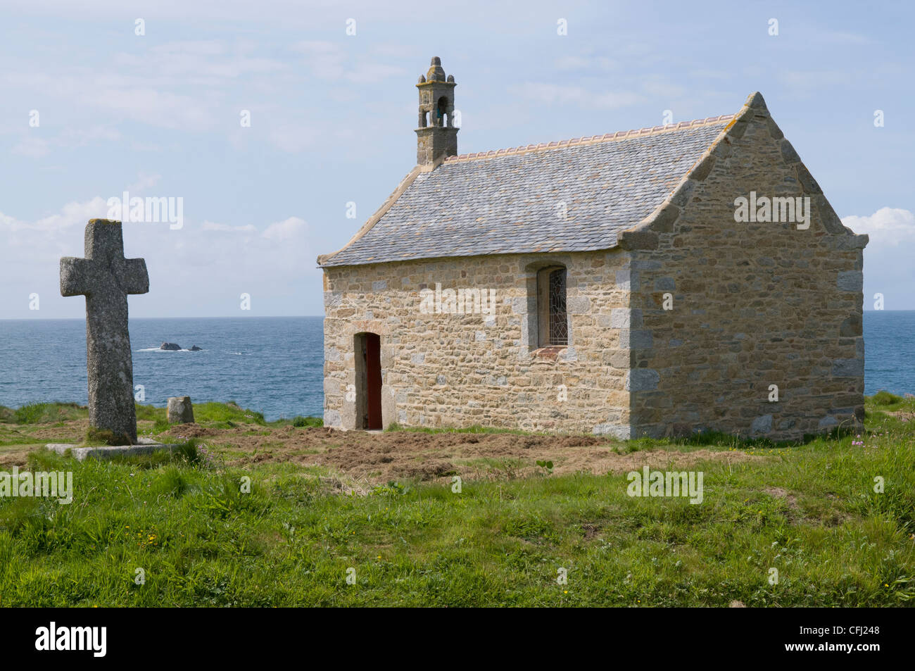Small stone church by the sea on the western coast of Brittany in ...