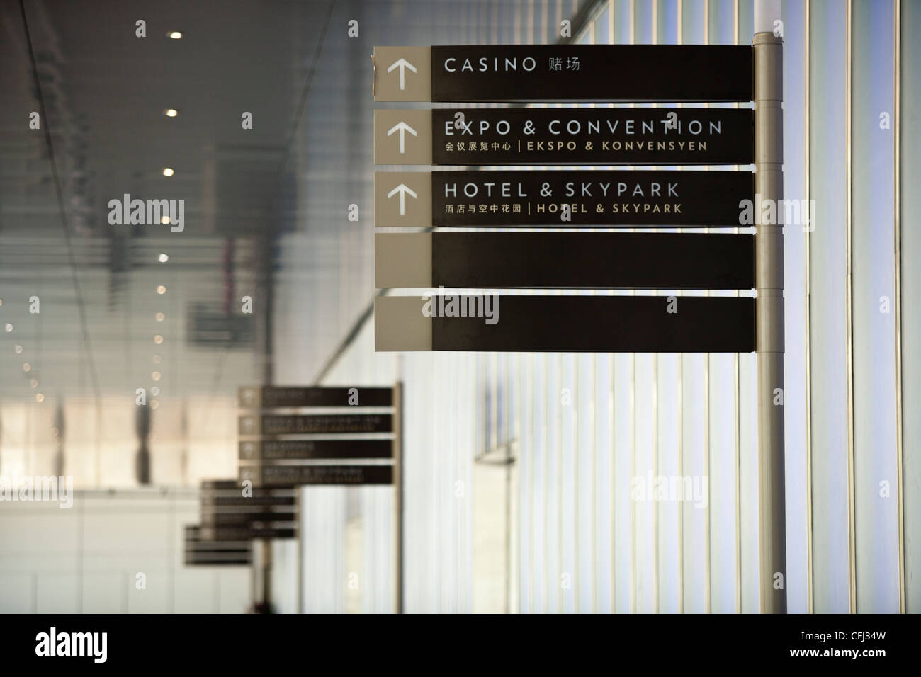 Signage outside the Las Vegas Sands Corp.'s Marina Bay Sands Resort ...