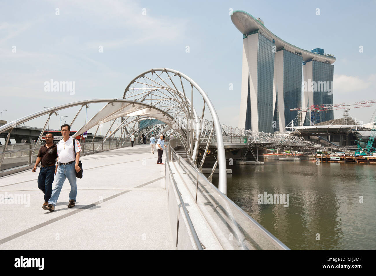Tourists take photos with the partially completed site of Las Vegas ...