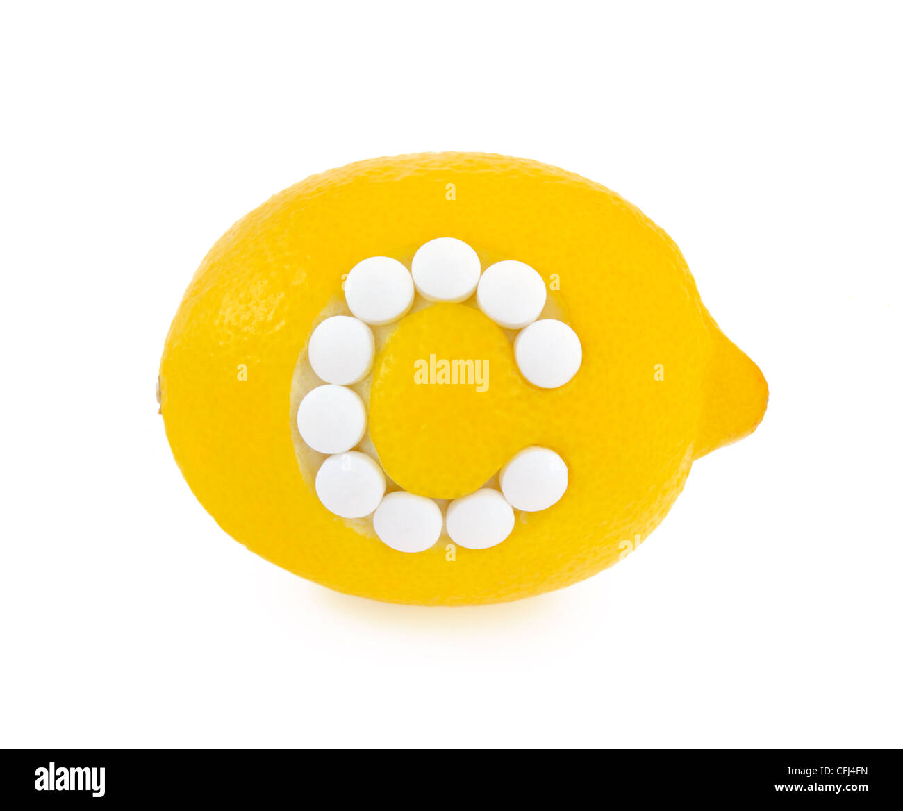 Lemon with vitamin c pills over white background - isolated - health ...