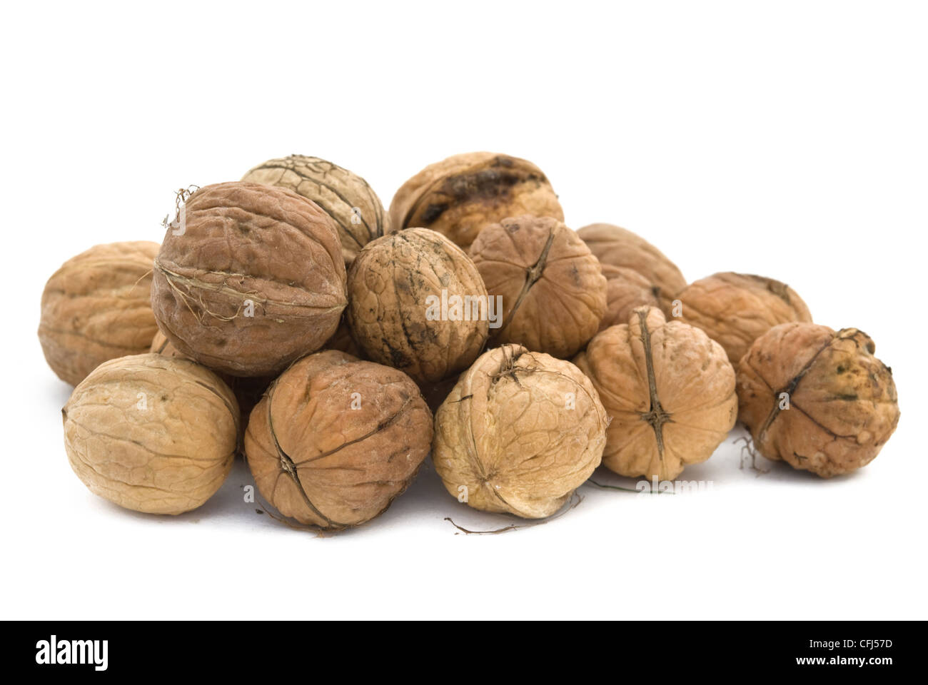 walnuts heap are isolated on a white background Stock Photo - Alamy