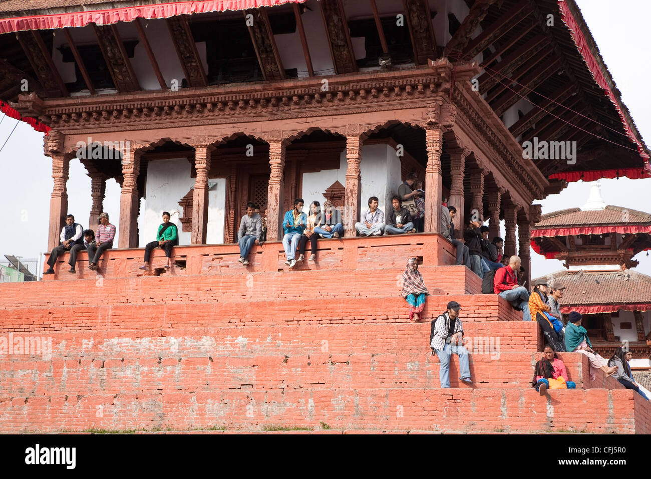 People sitting around Maju Deval Temple in Durbar Square - Kathmandu ...