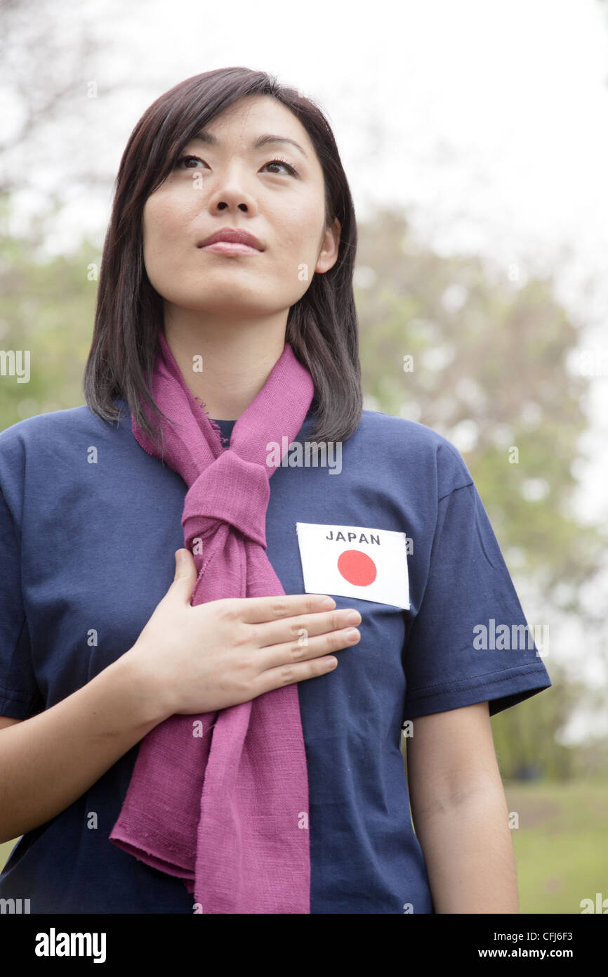 Young woman supporting the Japan women's national football team Stock ...
