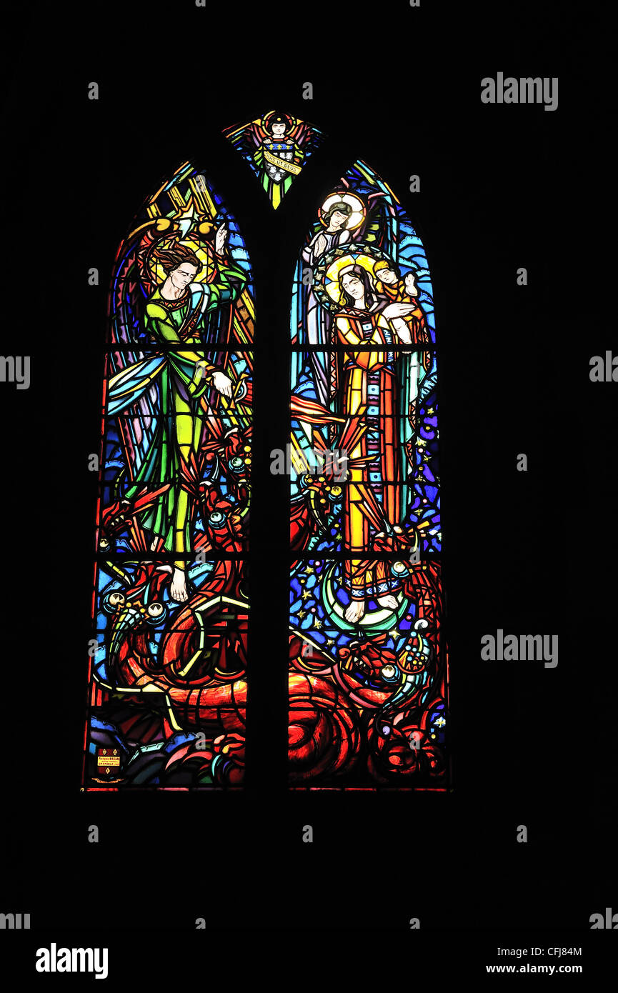Stained-glass window picturing Saint Michel fighting dragon. Mont Saint ...