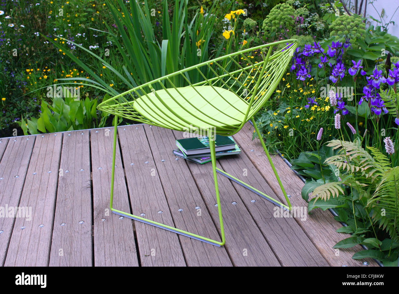 Chair and flowering plants hi-res stock photography and images - Alamy