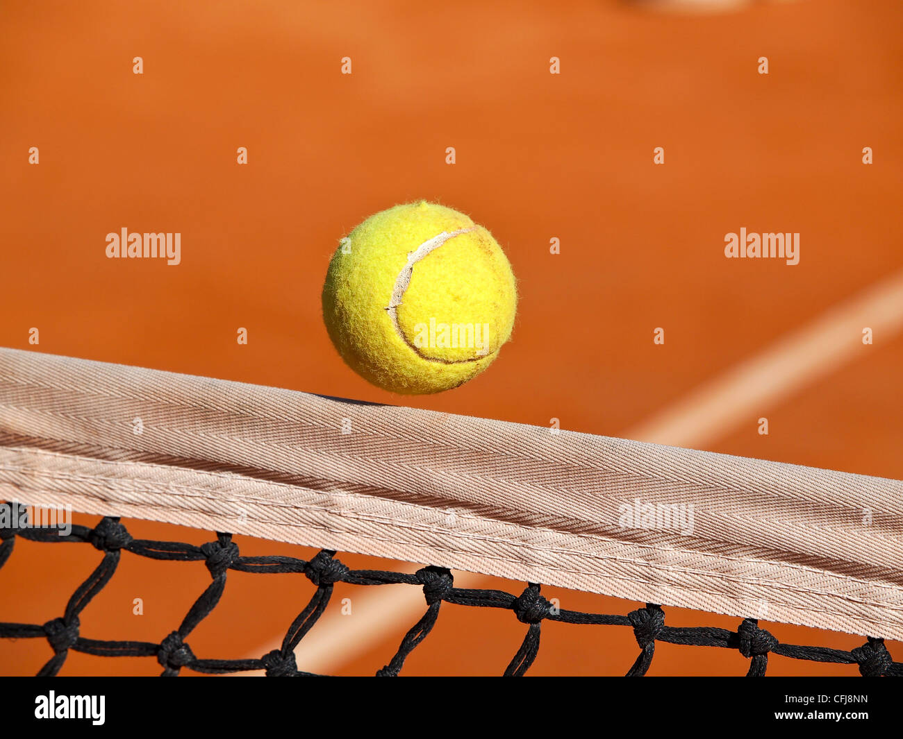 tennis ball over the net Stock Photo - Alamy