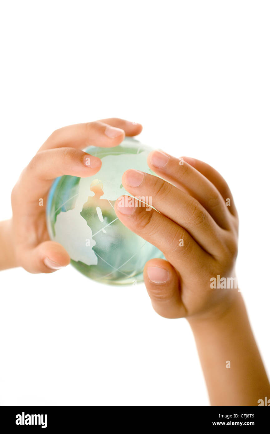Child holding a globe in hands Stock Photo - Alamy