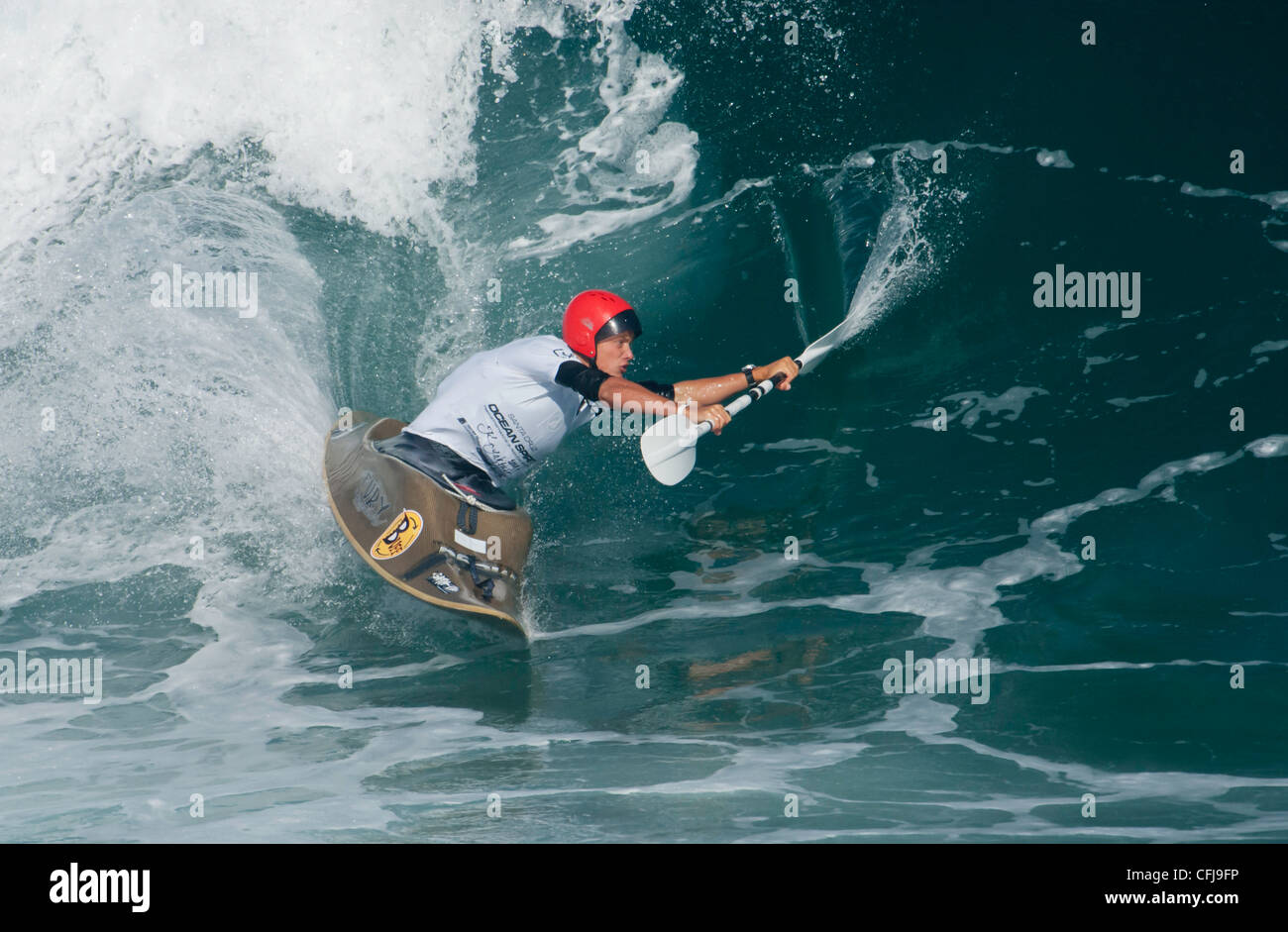 2009 world surf kayak champion Adam Harvey surfing a large wave Stock ...