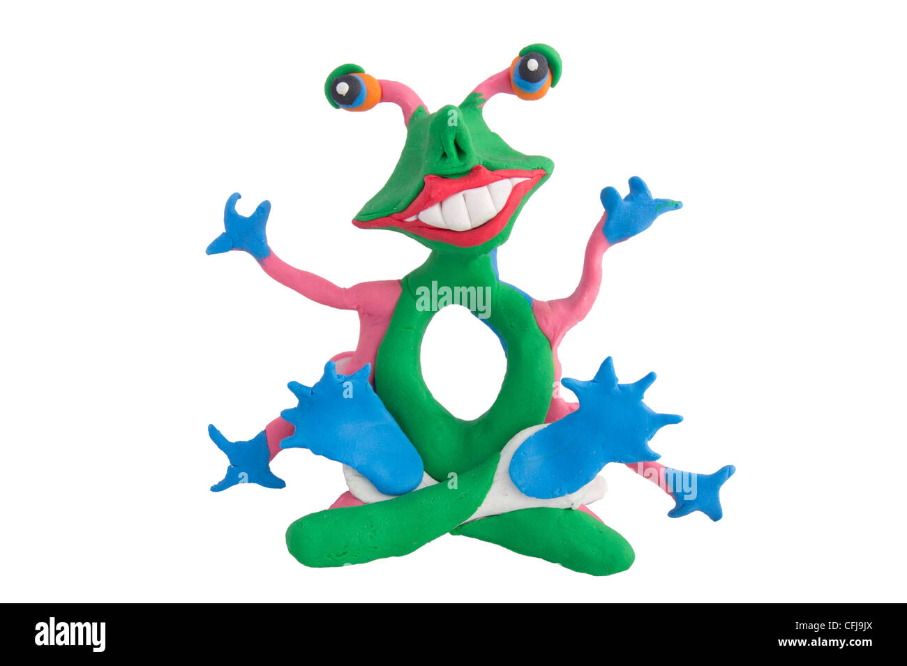 A colorful alien smiling in a lotus pose made of plasticine Stock Photo ...