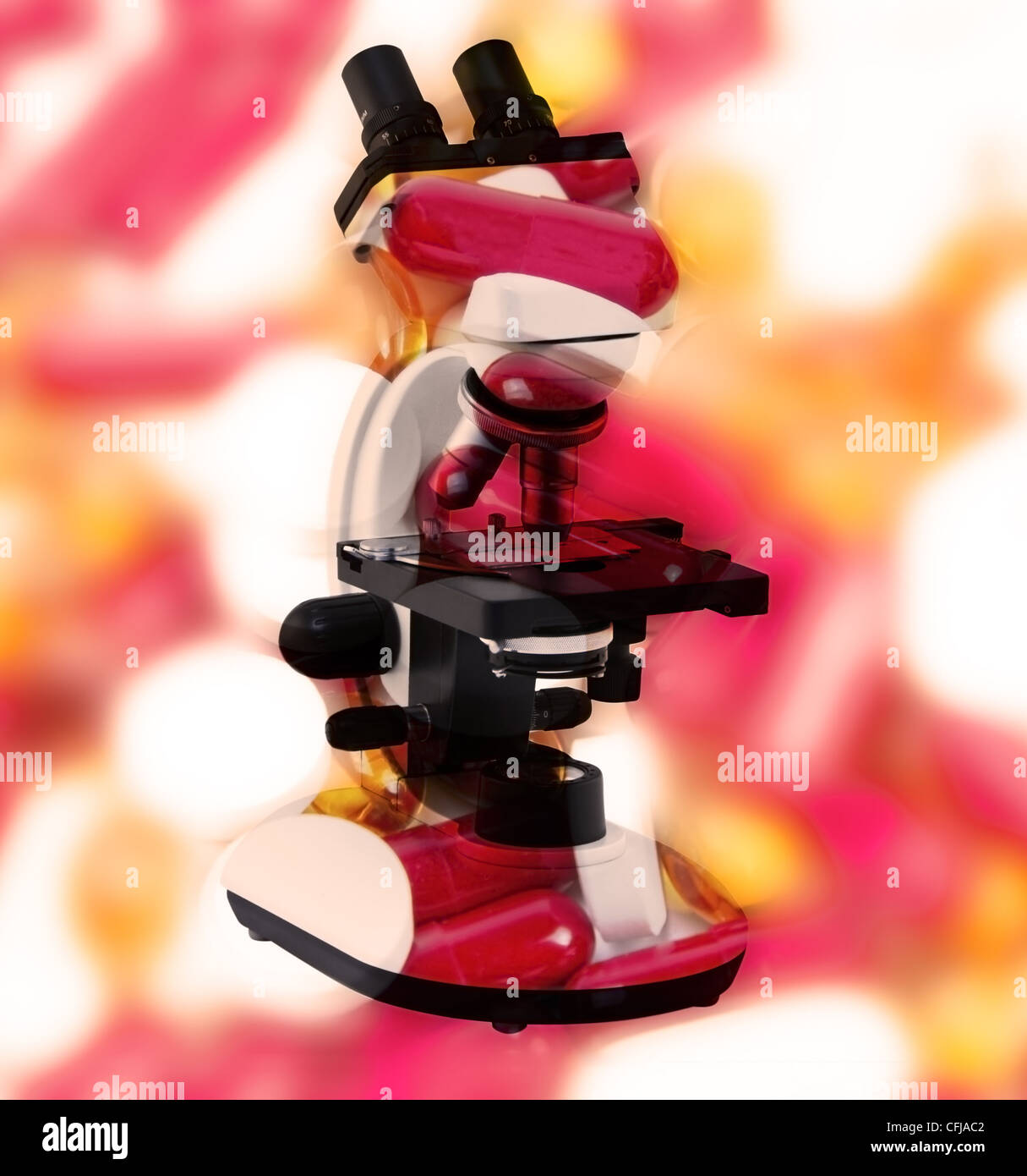 Image of a microscope blending with a stack of pills suggesting the ...