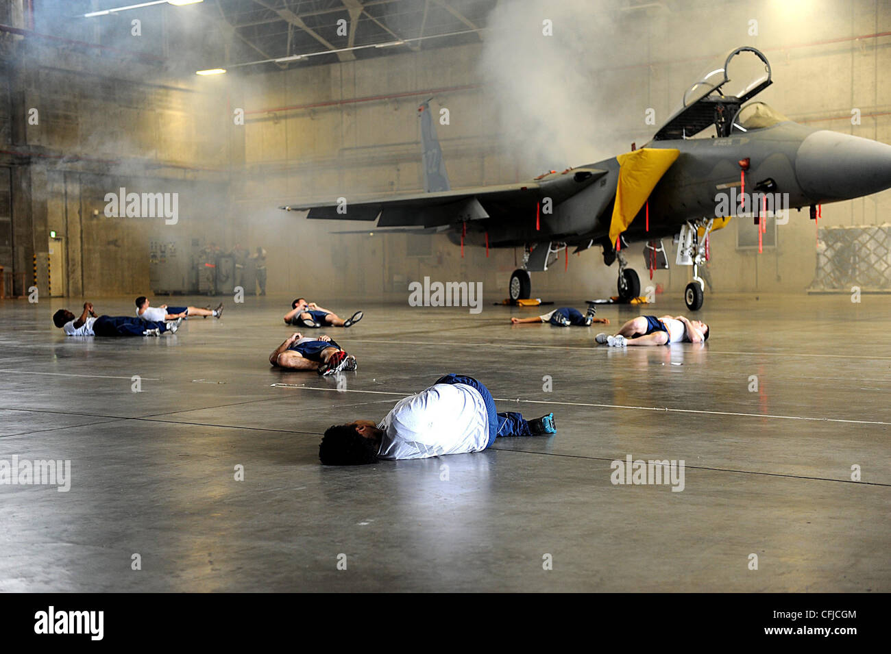 Volunteers act as victims of an explosion during a training scenario ...