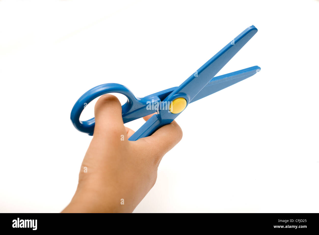 Hand holding open blue scissors isolated on white Stock Photo - Alamy