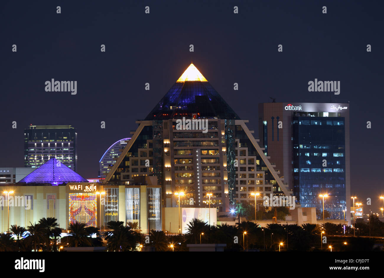 Pyramid shaped WAFI Mall in Dubai City illuminated at night Stock Photo ...