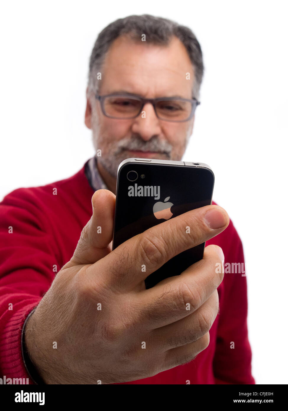 Man holding iphone 4 hi-res stock photography and images - Alamy