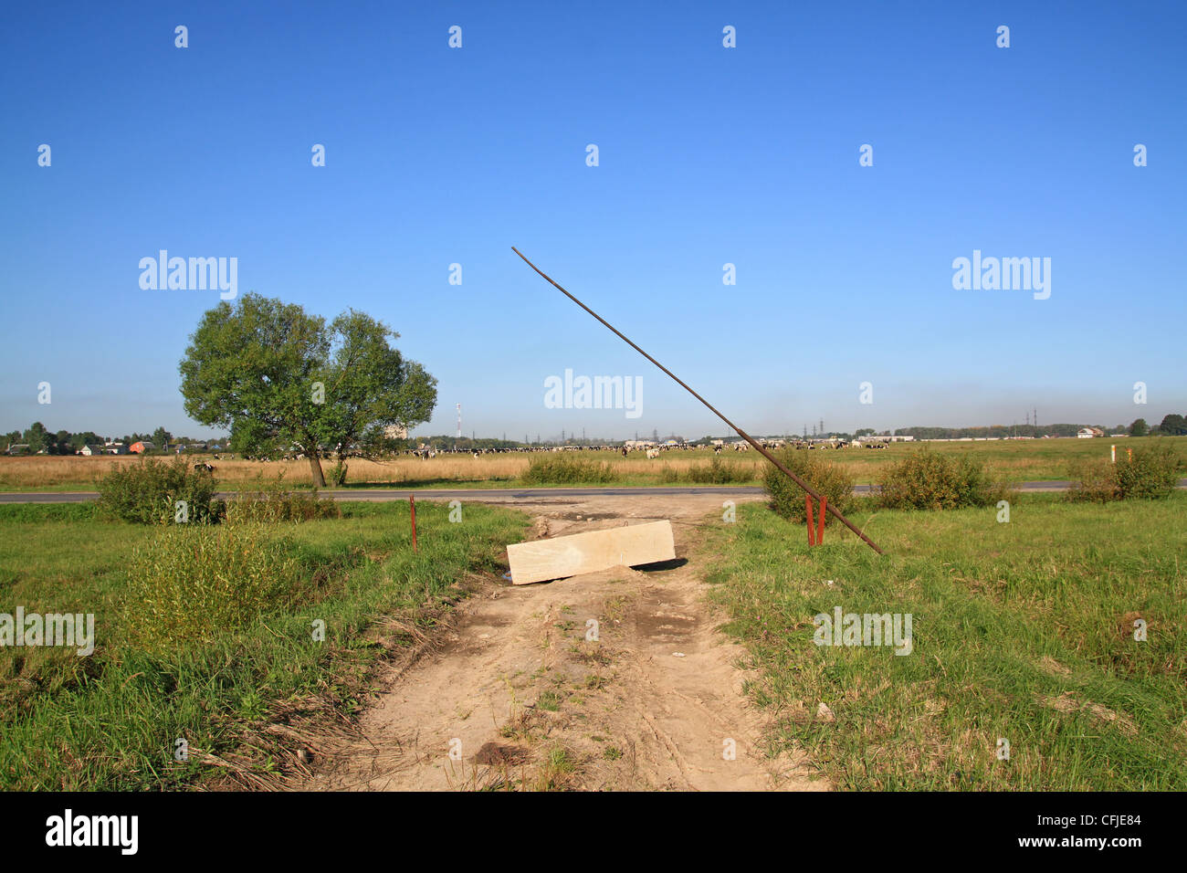 old barrier on rural road Stock Photo - Alamy