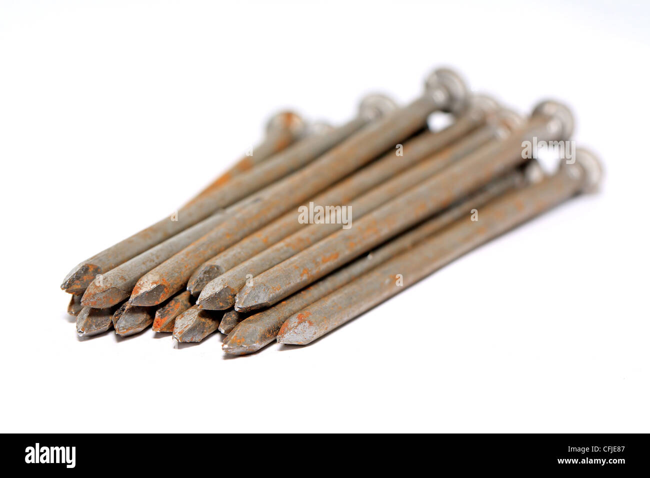 old nail on white background Stock Photo - Alamy