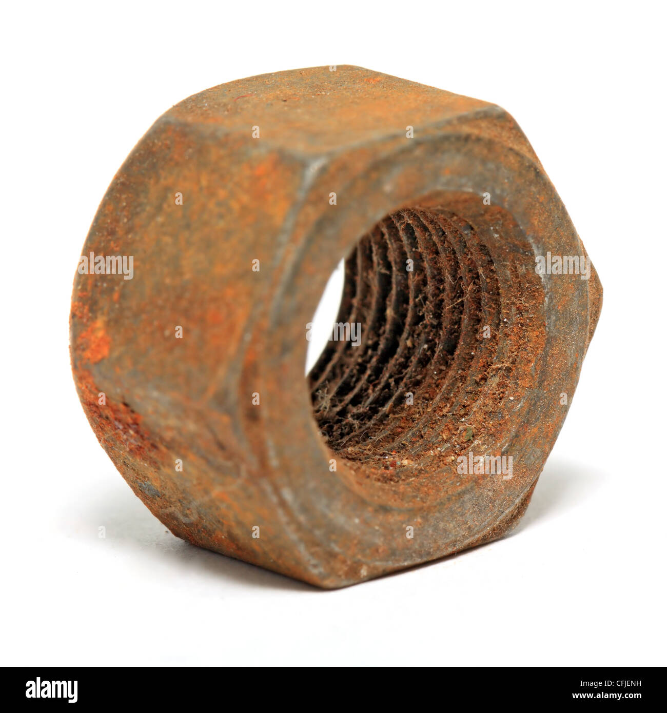 aging rusty nut on white background Stock Photo - Alamy