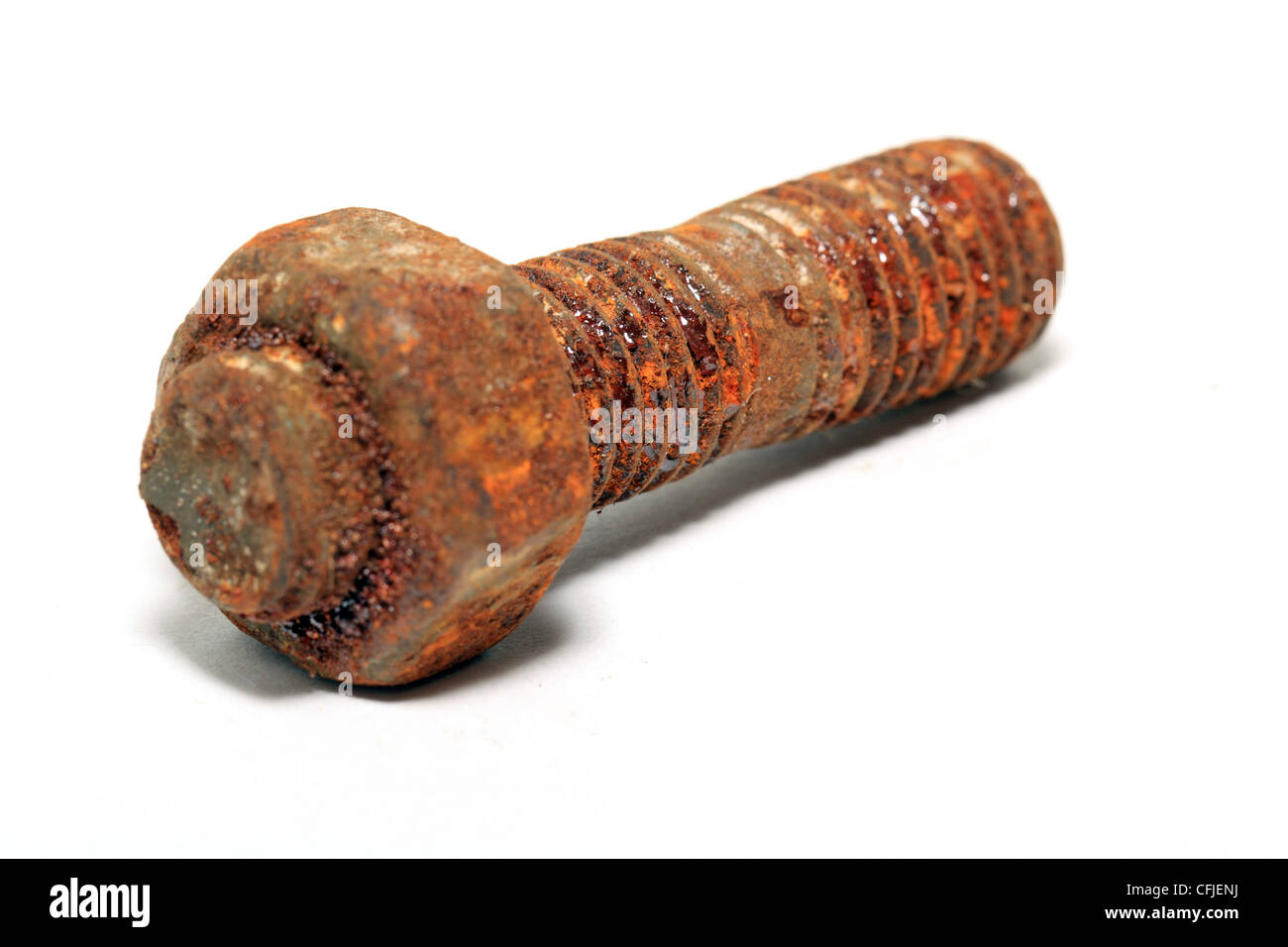 aging rusty nut on white background Stock Photo - Alamy