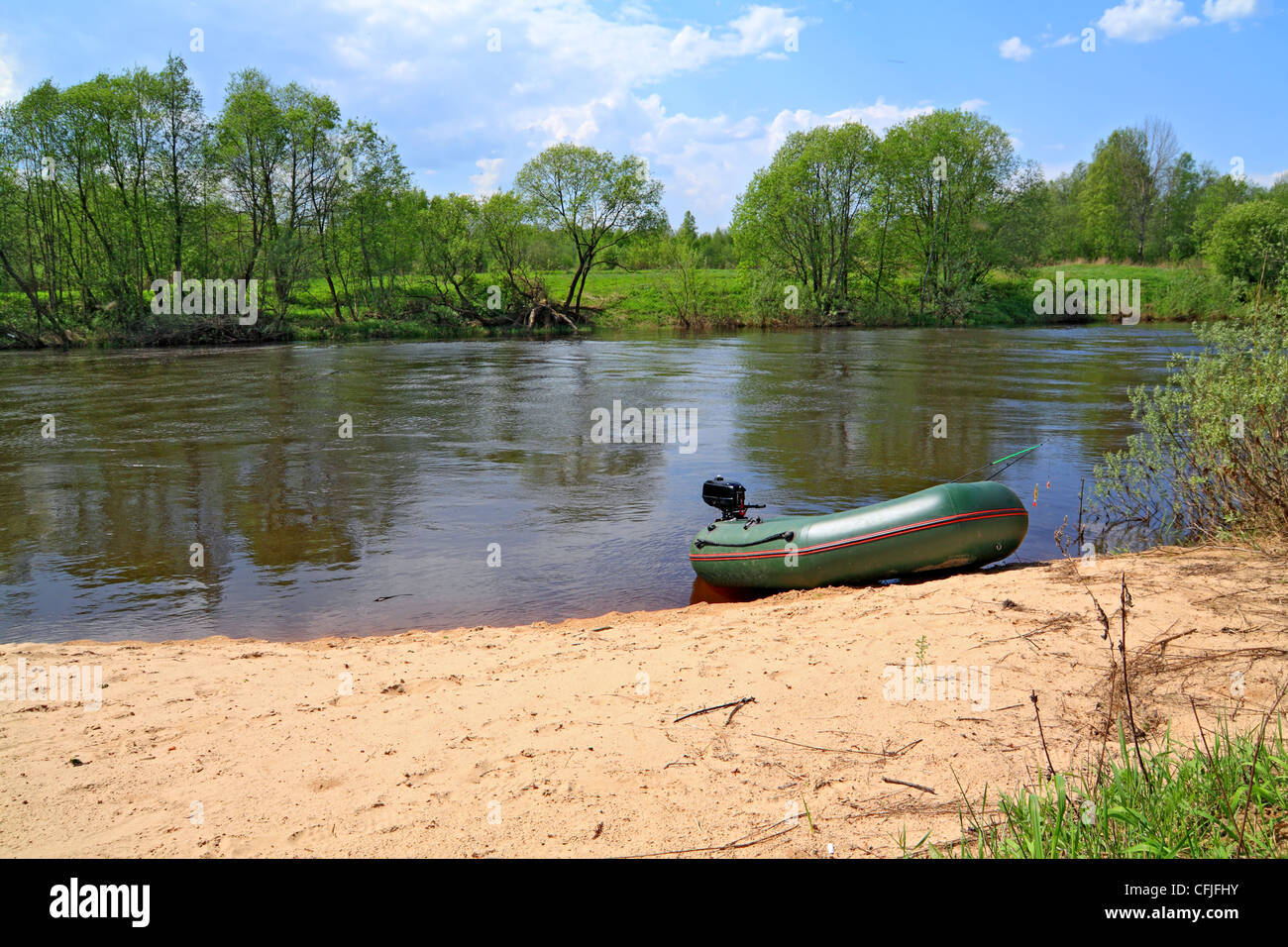 motor boat on river coast Stock Photo - Alamy